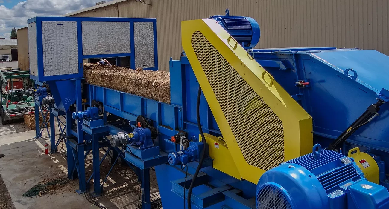 Automated bale processing systems deliver process ready feedstock ...